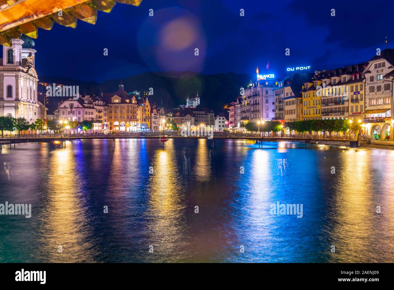 Reuss River and City of Lucerne at Night with Lens Flare in Switzerland ...