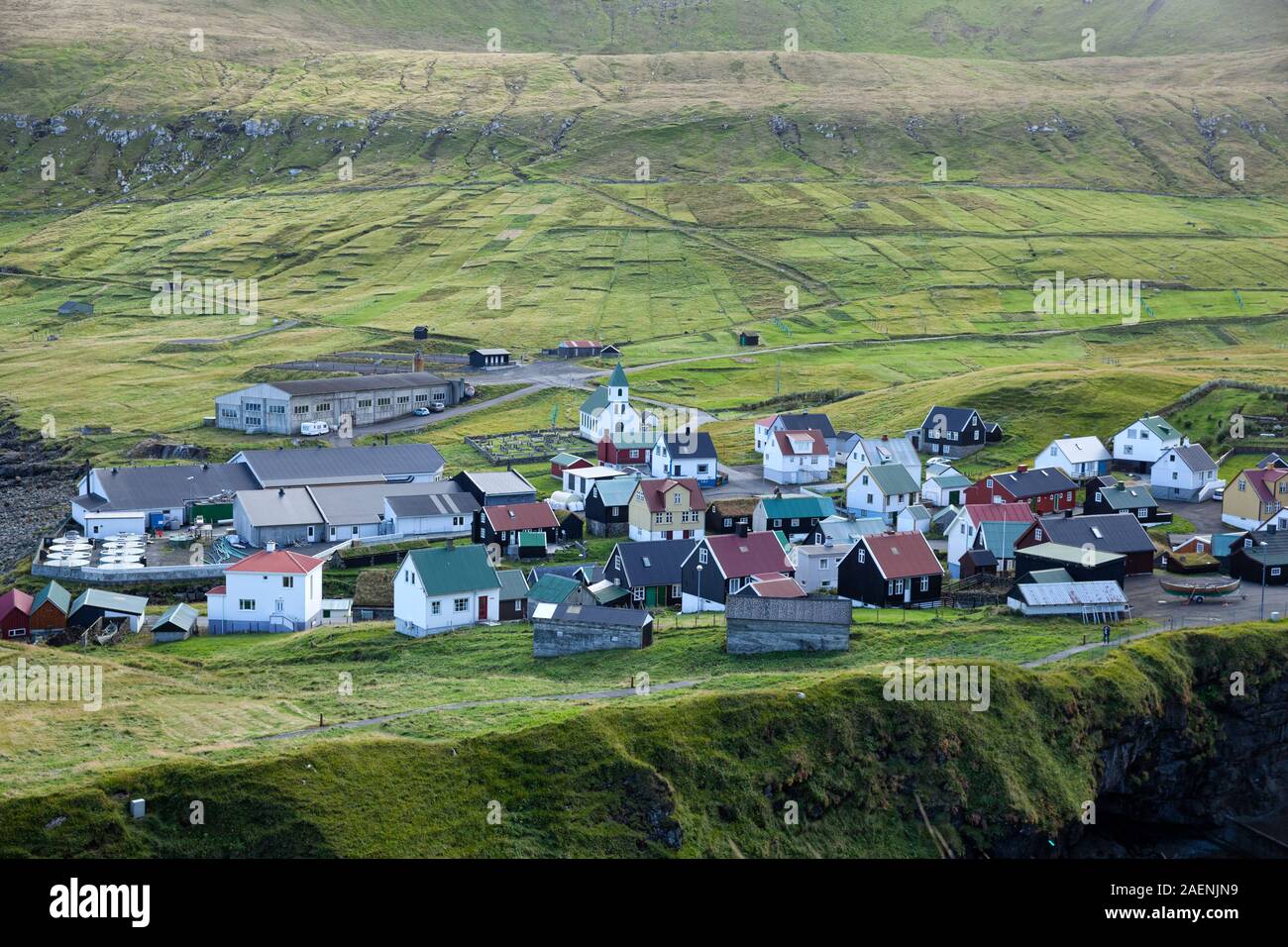 Village of Gjogv and its surrounding mountains showing a gorge Stock ...