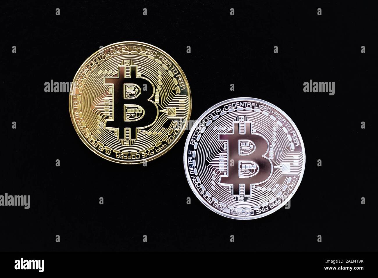 Silver and gold bitcoins on black background. Bitcoin mining concept. A ...