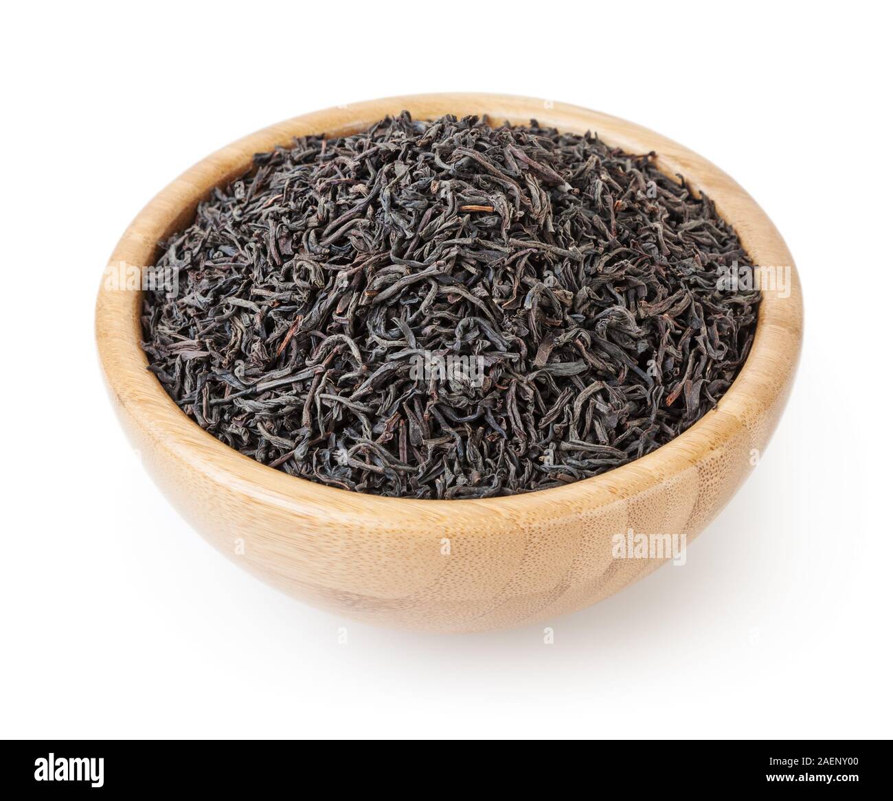 Black tea in wooden bowl isolated on white background with clipping ...