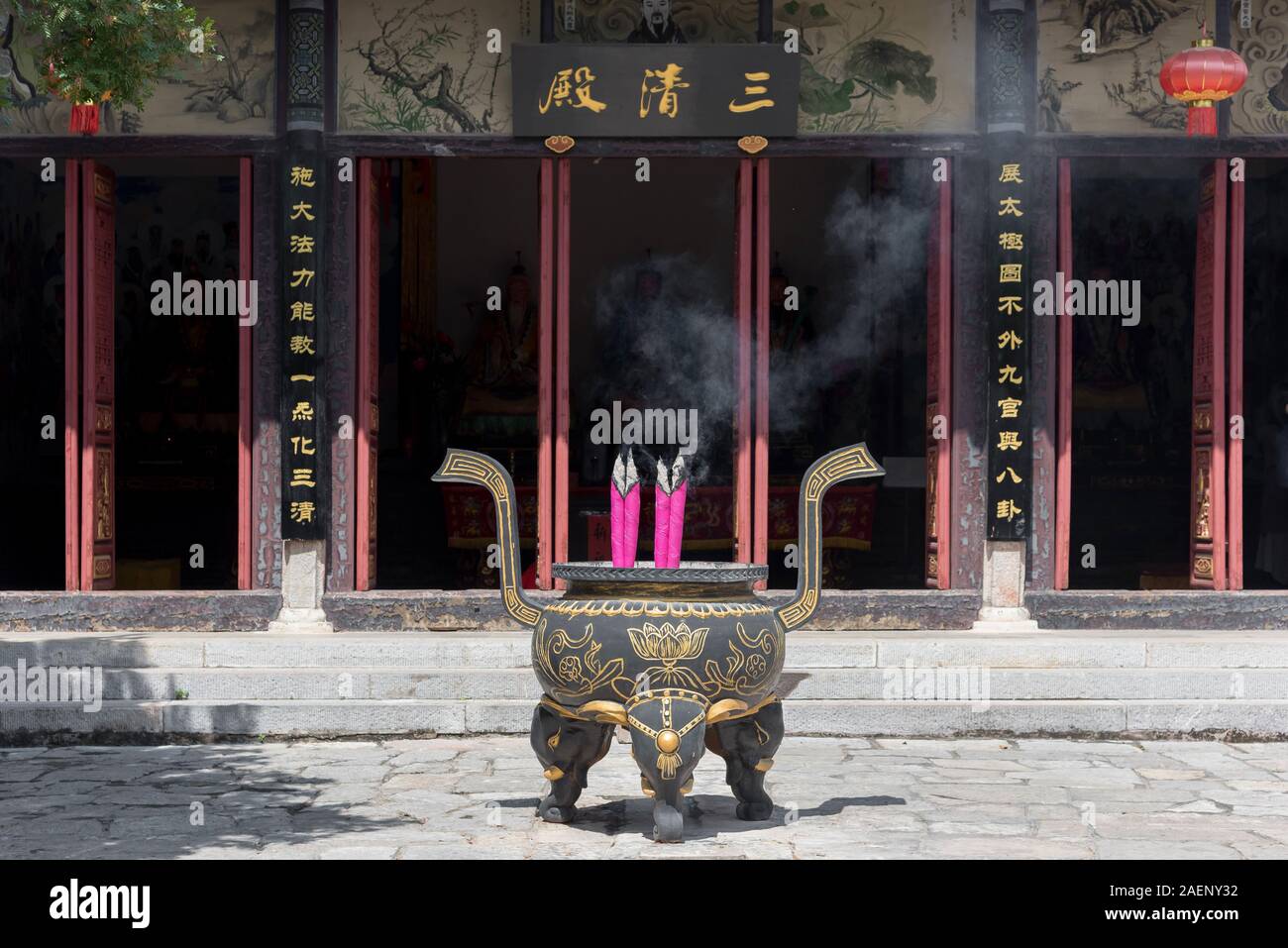 Burning incense sticks in a Chinese Temple in Jianshui, China Stock ...