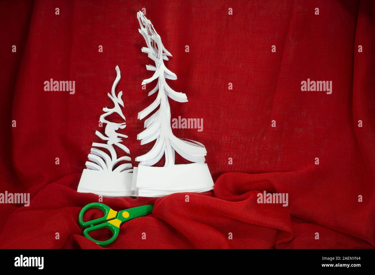 Christmas handicrafts and homemade decorations in a festive background ...