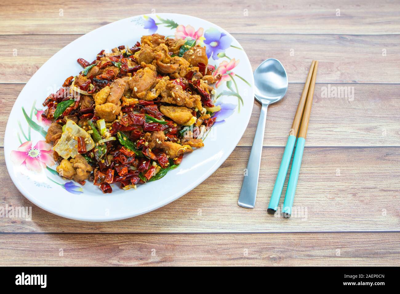 Authentic Sichuan Szechuan fried chicken with spicy red hot chillies ...