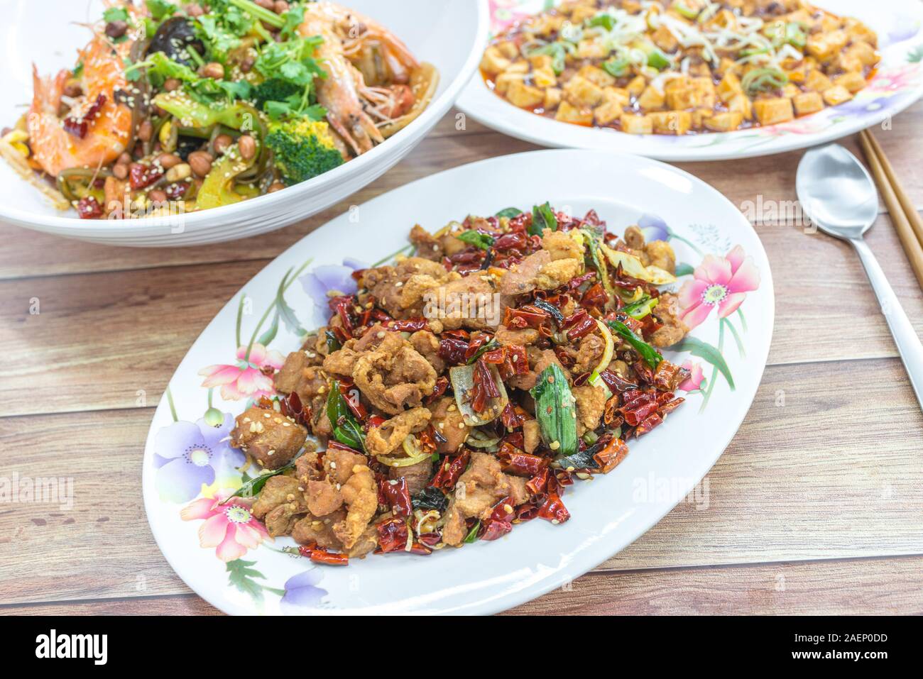 Authentic Sichuan Szechuan fried chicken with spicy red hot chillies ...