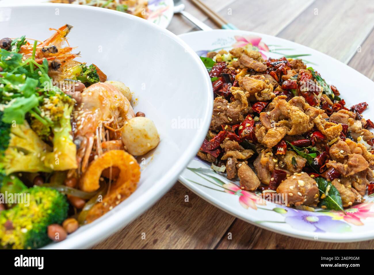 Authentic Sichuan Szechuan fried chicken with spicy red hot chillies ...