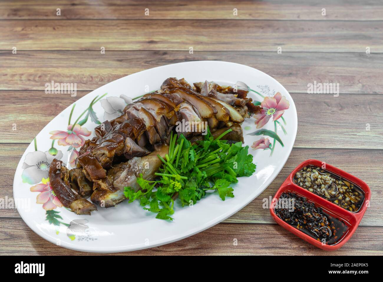 Sliced braised pork trotters, Chinese style. Asian food on table Stock ...