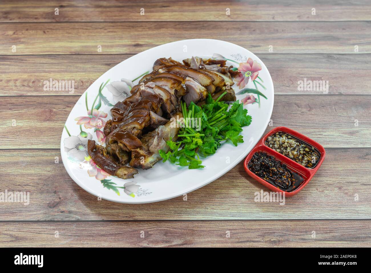 Sliced braised pork trotters, Chinese style. Asian food on table Stock ...
