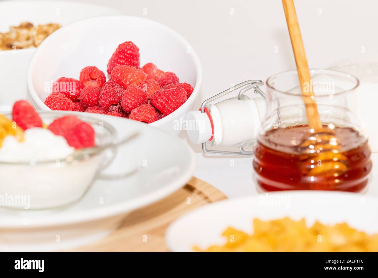 Healthy balanced Breakfast of cereals and dairy products with berries ...