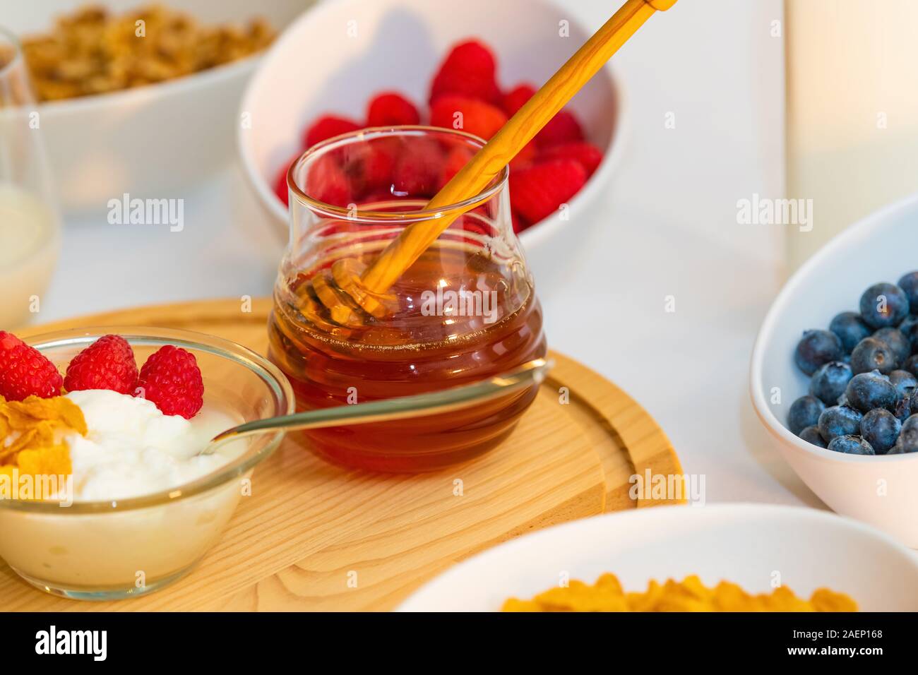 Healthy balanced Breakfast of cereals and dairy products with berries ...