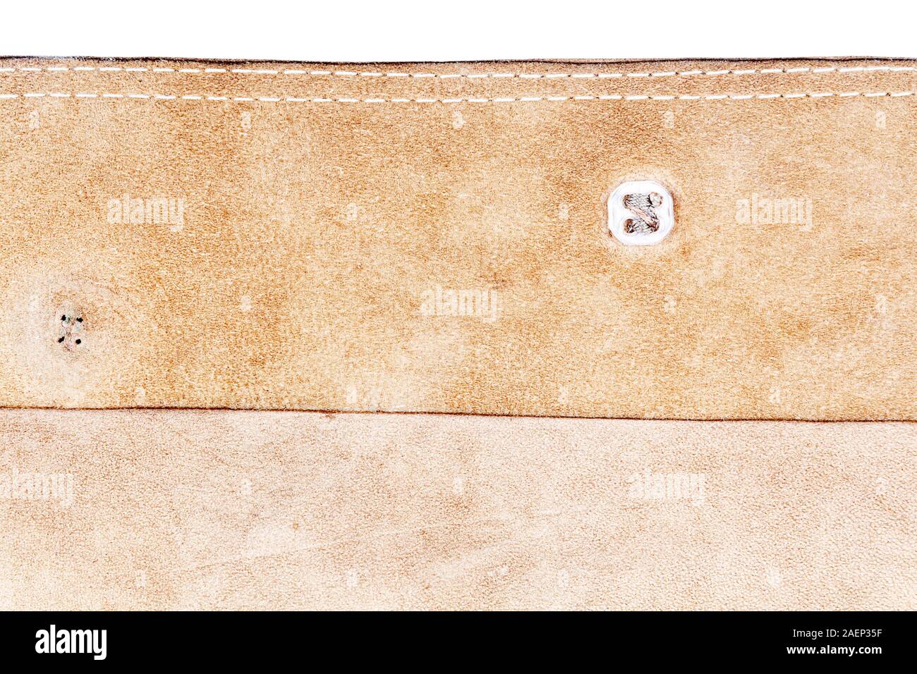 Piece of brown leather isolated on white background. Back side Stock ...