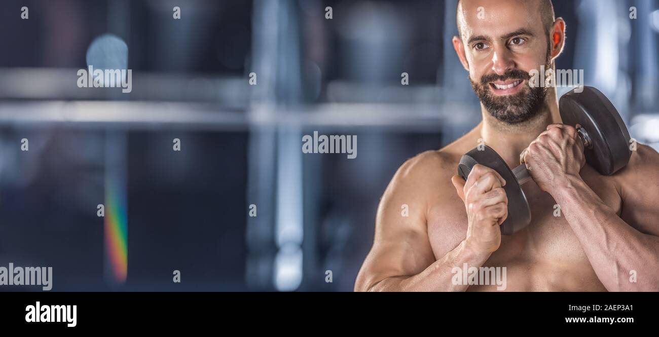 Man holding dumbbell hi-res stock photography and images - Alamy