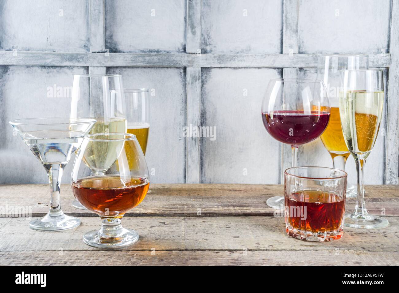 Selection of different alcoholic drinks - beer, red white wine, martini ...