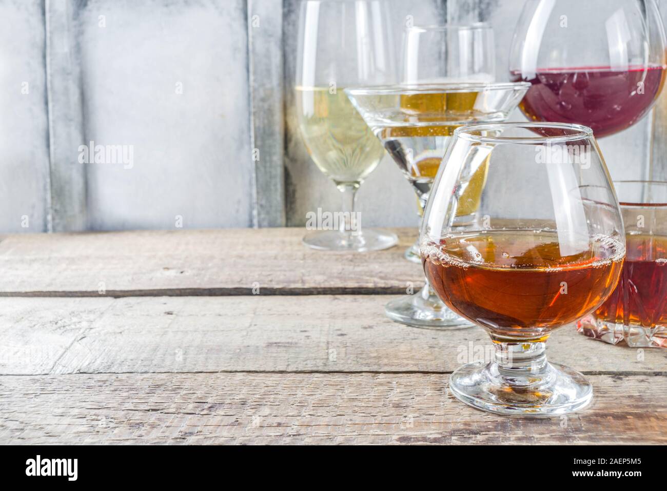 Selection of different alcoholic drinks - beer, red white wine, martini ...