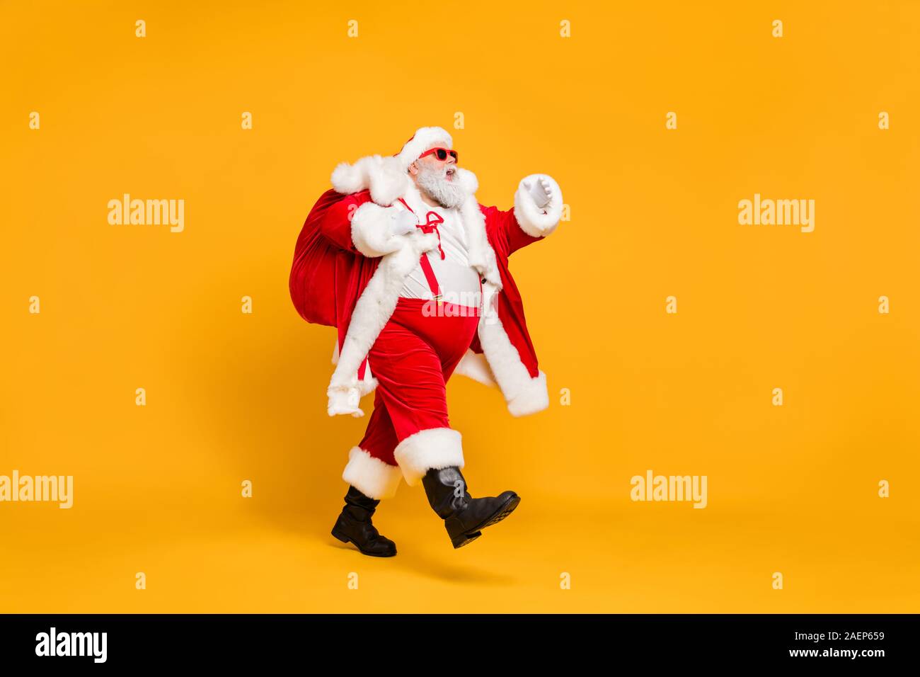 Full size profile side photo of funky fat santa claus with huge abdomen ...