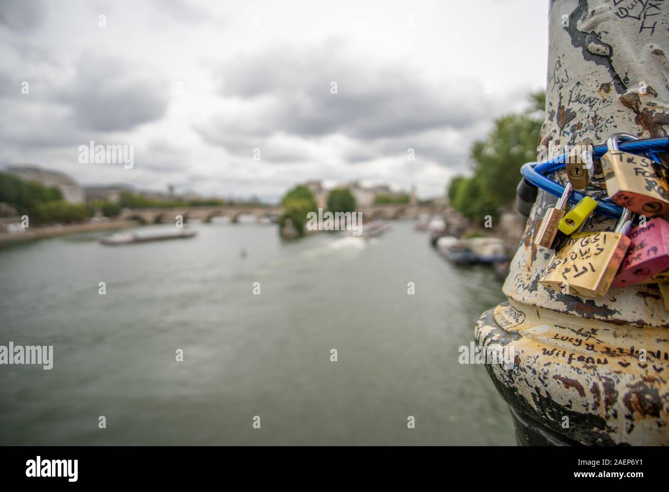 Boats and Locks on Bridge at Seine Stock Photo - Alamy