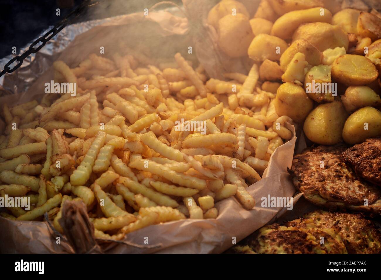 Fried potatoes on the street of small city in holidays Stock Photo - Alamy