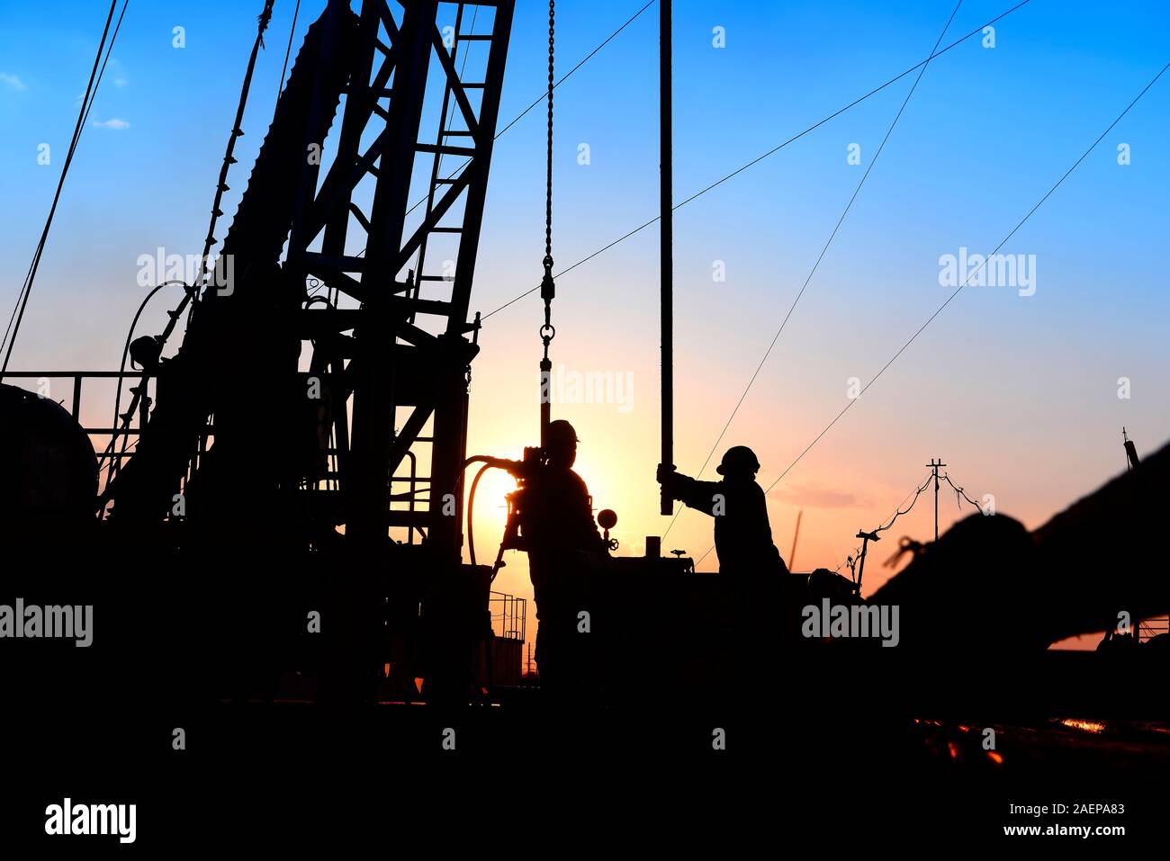 oil field, the oil workers are working Stock Photo - Alamy