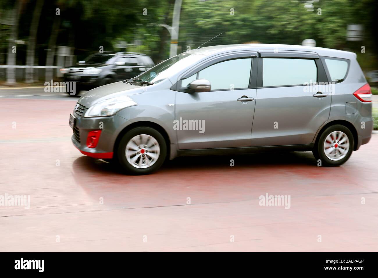 Suzuki R3 family car, passing by at Lapangan Banteng area, Jakarta ...