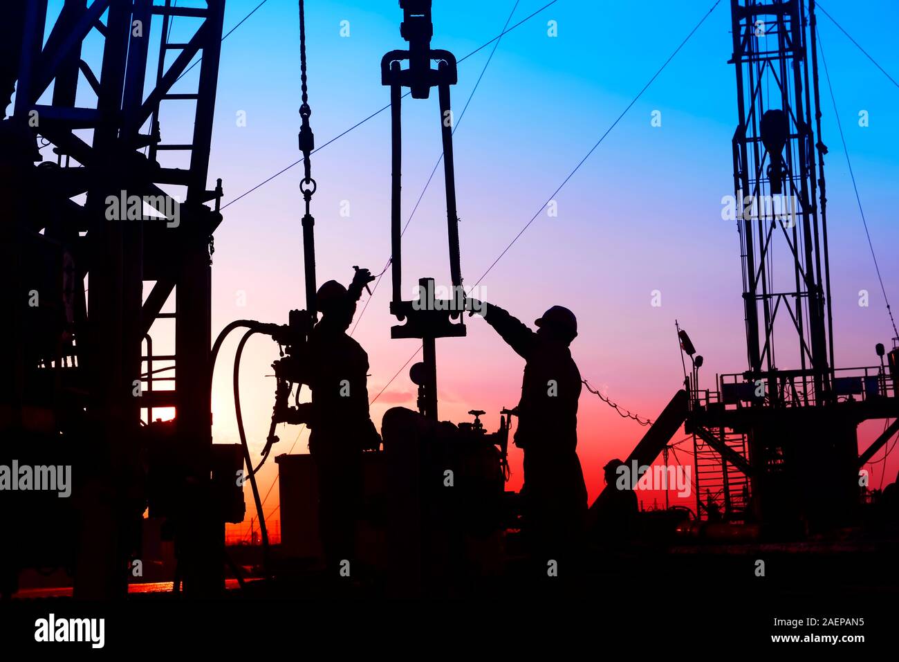 oil field, the oil workers are working Stock Photo - Alamy