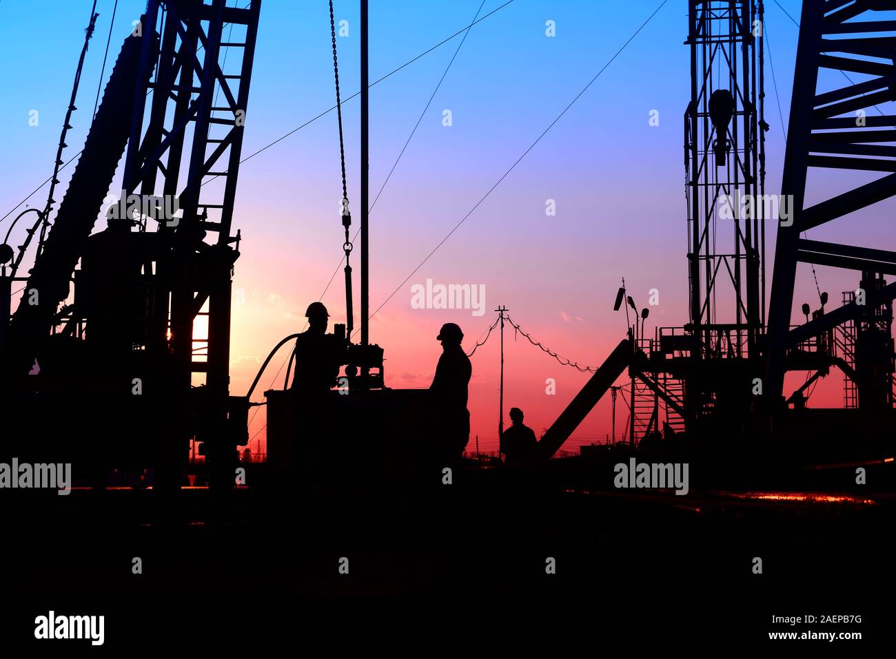 oil field, the oil workers are working Stock Photo - Alamy