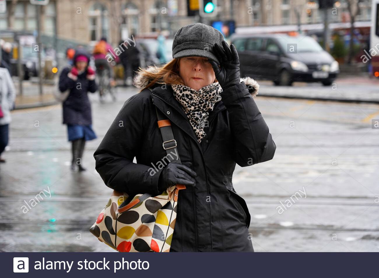 Wind gust woman hi-res stock photography and images - Alamy