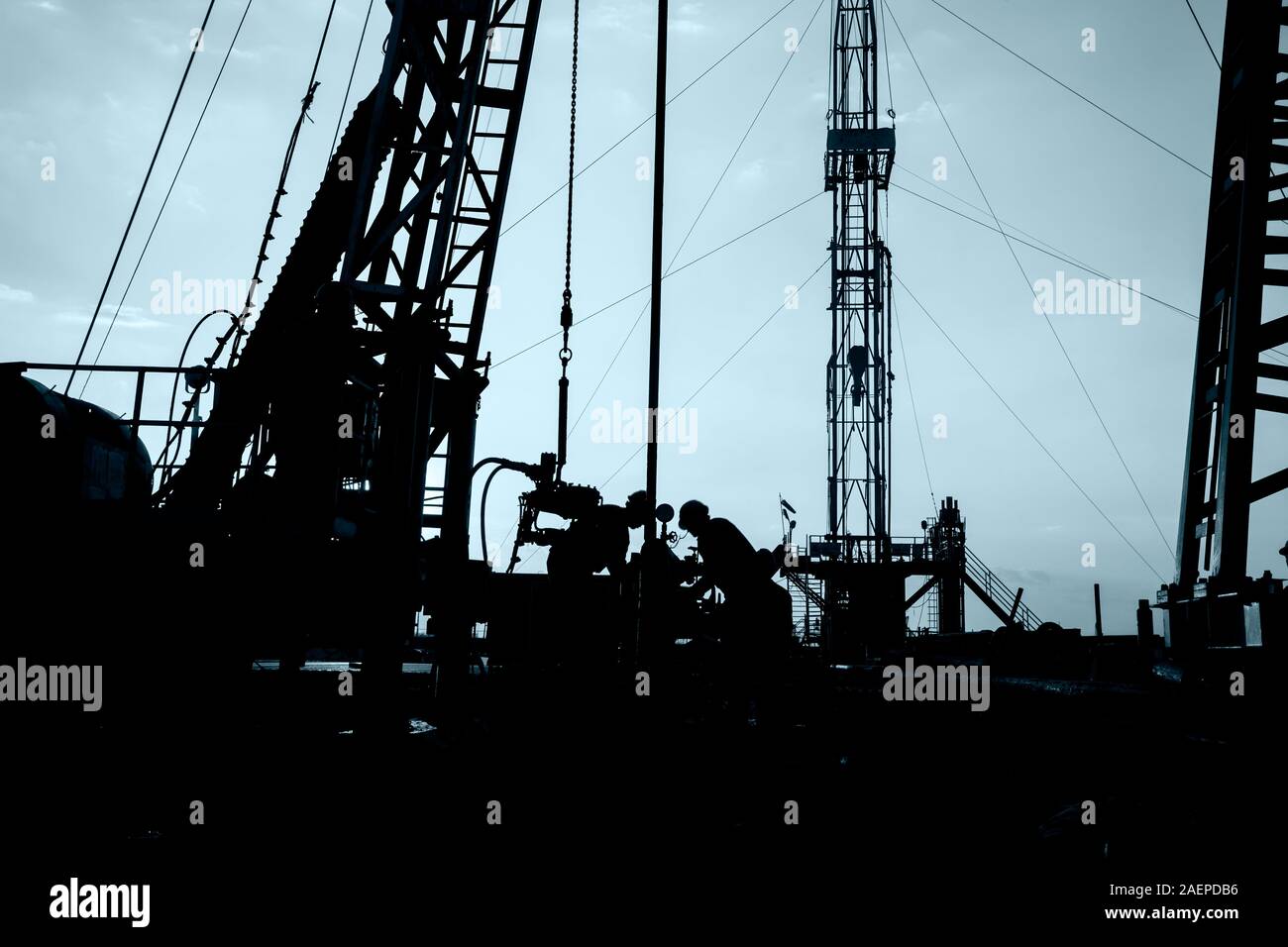 oil field, the oil workers are working Stock Photo - Alamy