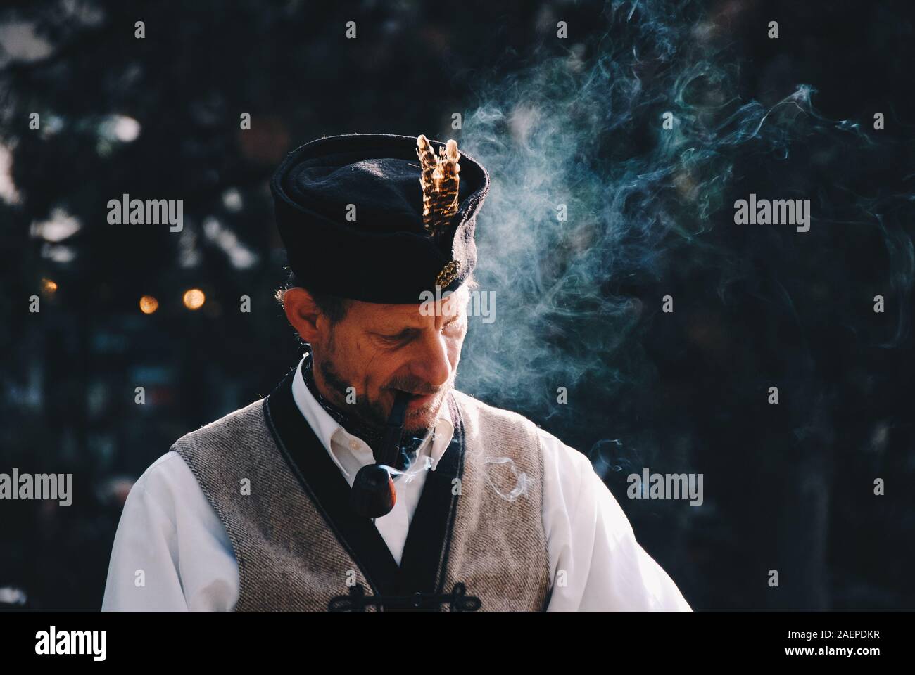 Smoking man playing music Stock Photo - Alamy