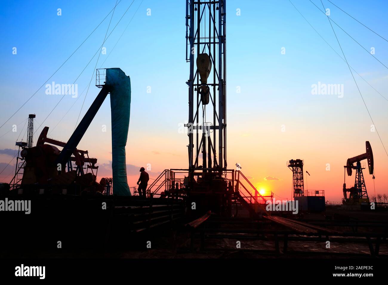 oil field, the oil workers are working Stock Photo - Alamy