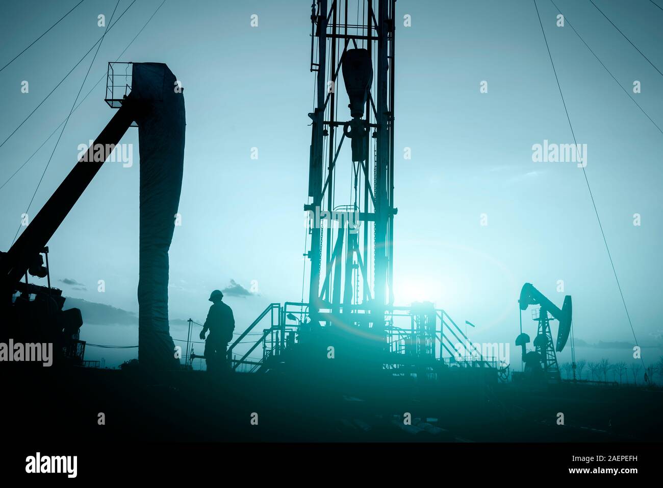 oil field, the oil workers are working Stock Photo - Alamy