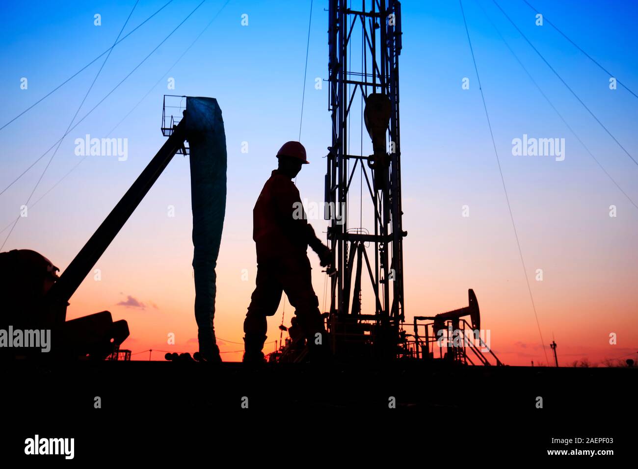 oil field, the oil workers are working Stock Photo - Alamy