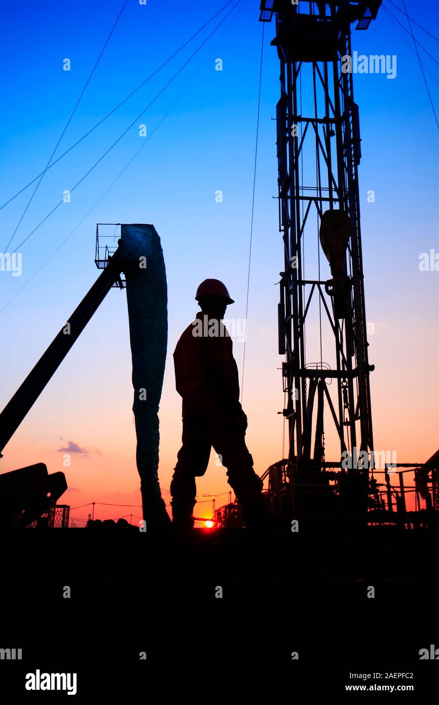 oil field, the oil workers are working Stock Photo - Alamy