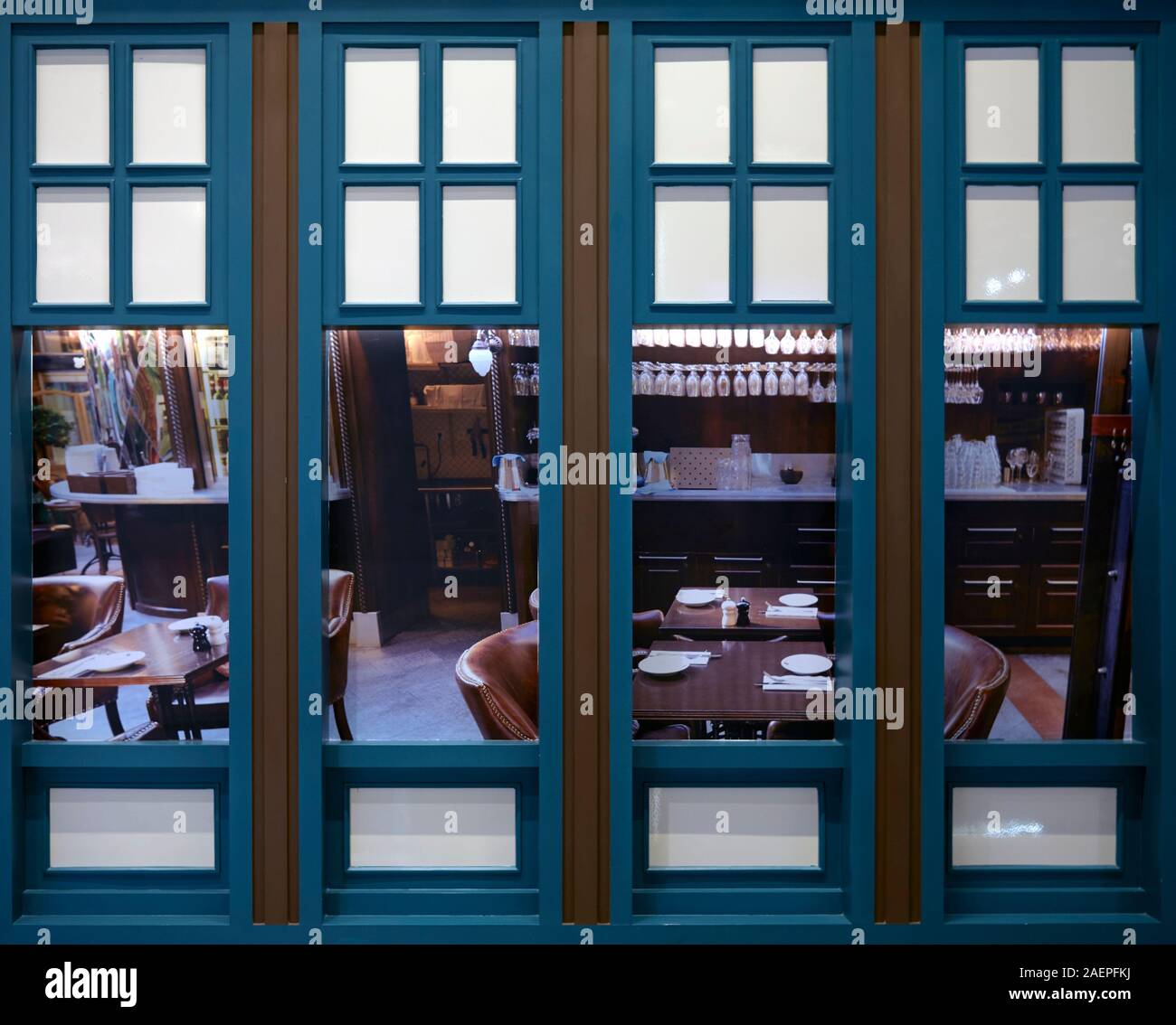 Looking through a window at a deserted restaurant interior Stock Photo ...