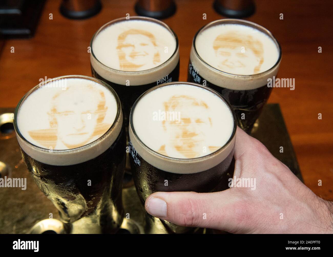 Political pints showing the faces of prime minister boris johnson hi ...