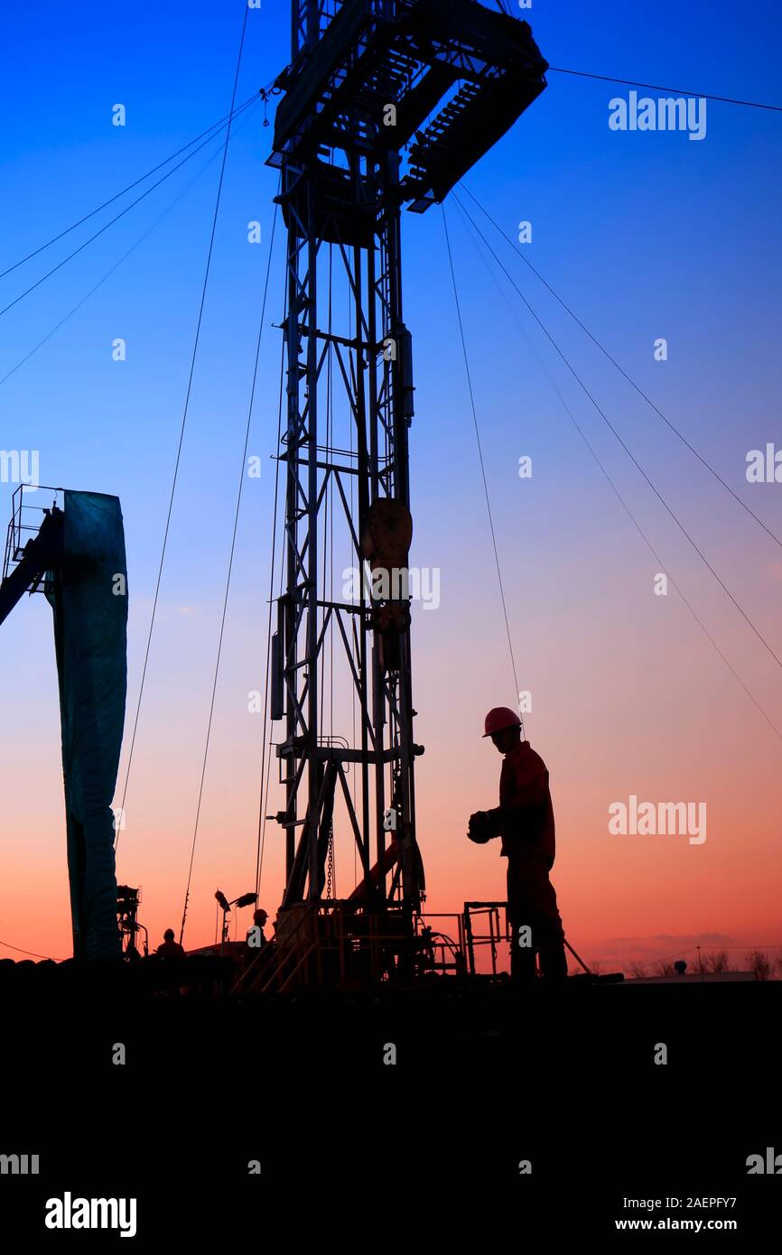 oil field, the oil workers are working Stock Photo - Alamy