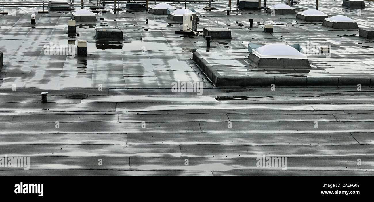 flat roof of an industrial hall, as background Stock Photo - Alamy