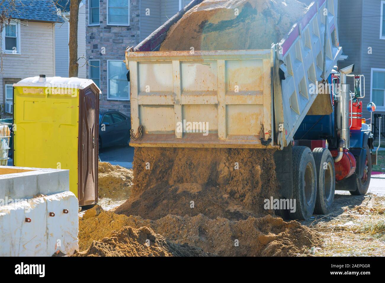 Truck pour soil on the ground in is under construction area Stock Photo ...