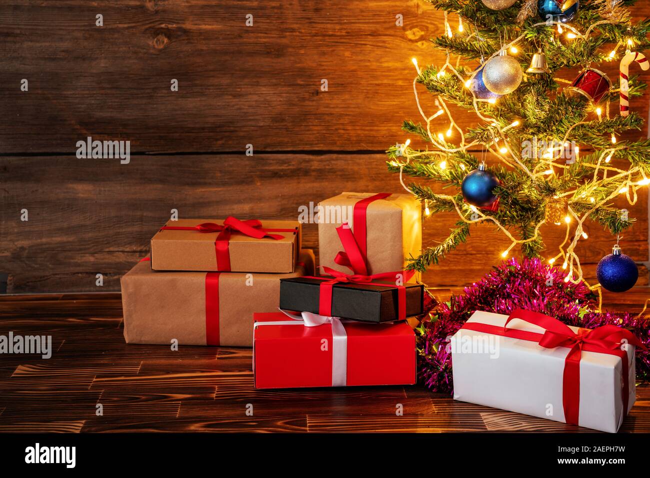 Christmas present concept with decorated christmas tree. New year ...