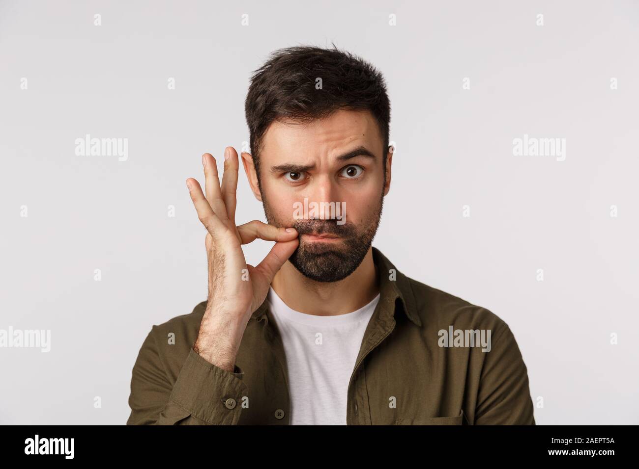 Man zip mouth hi-res stock photography and images - Alamy