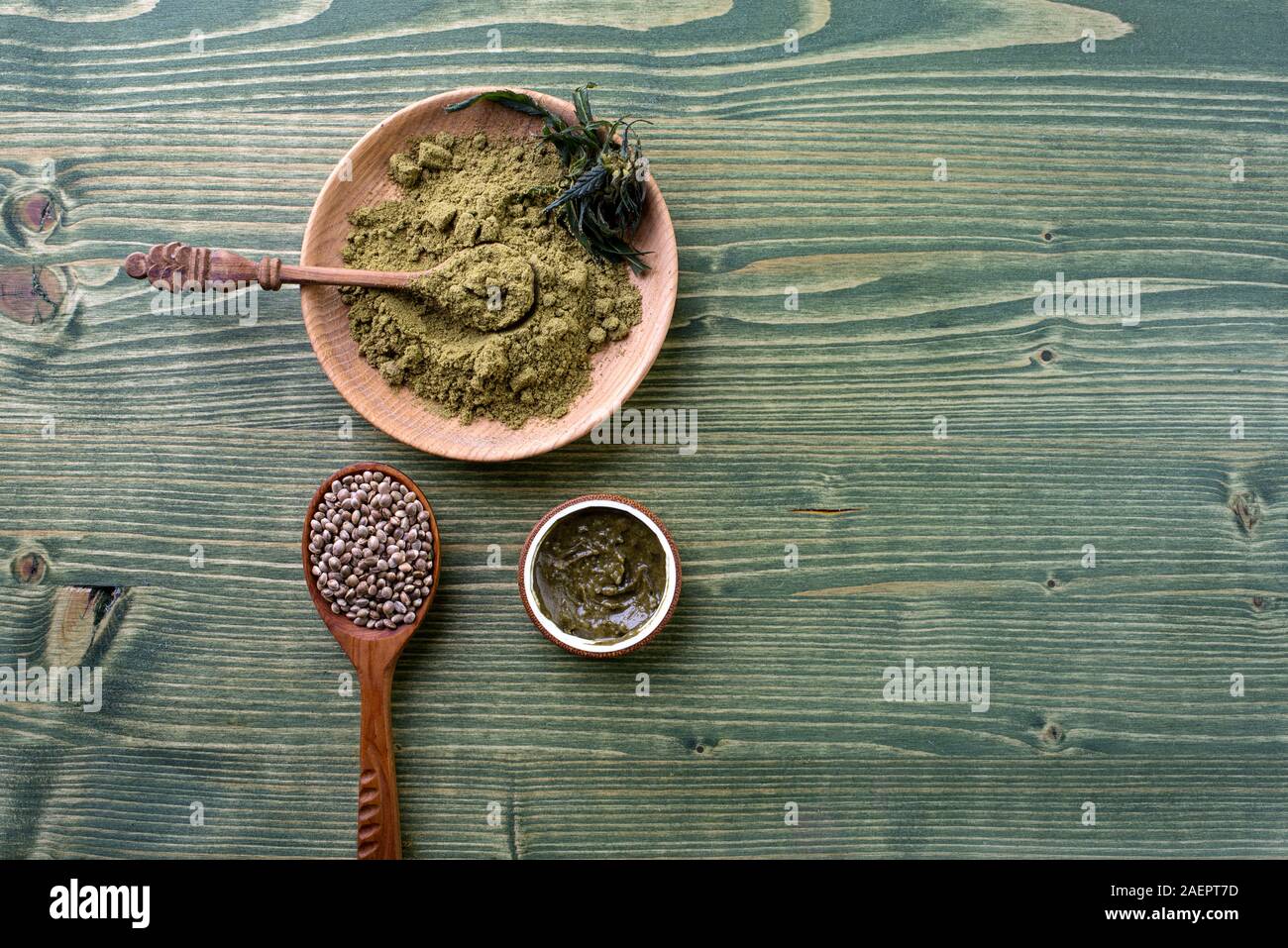 Composition with jar of hemp protein powder, cannabis seeds, organic ...