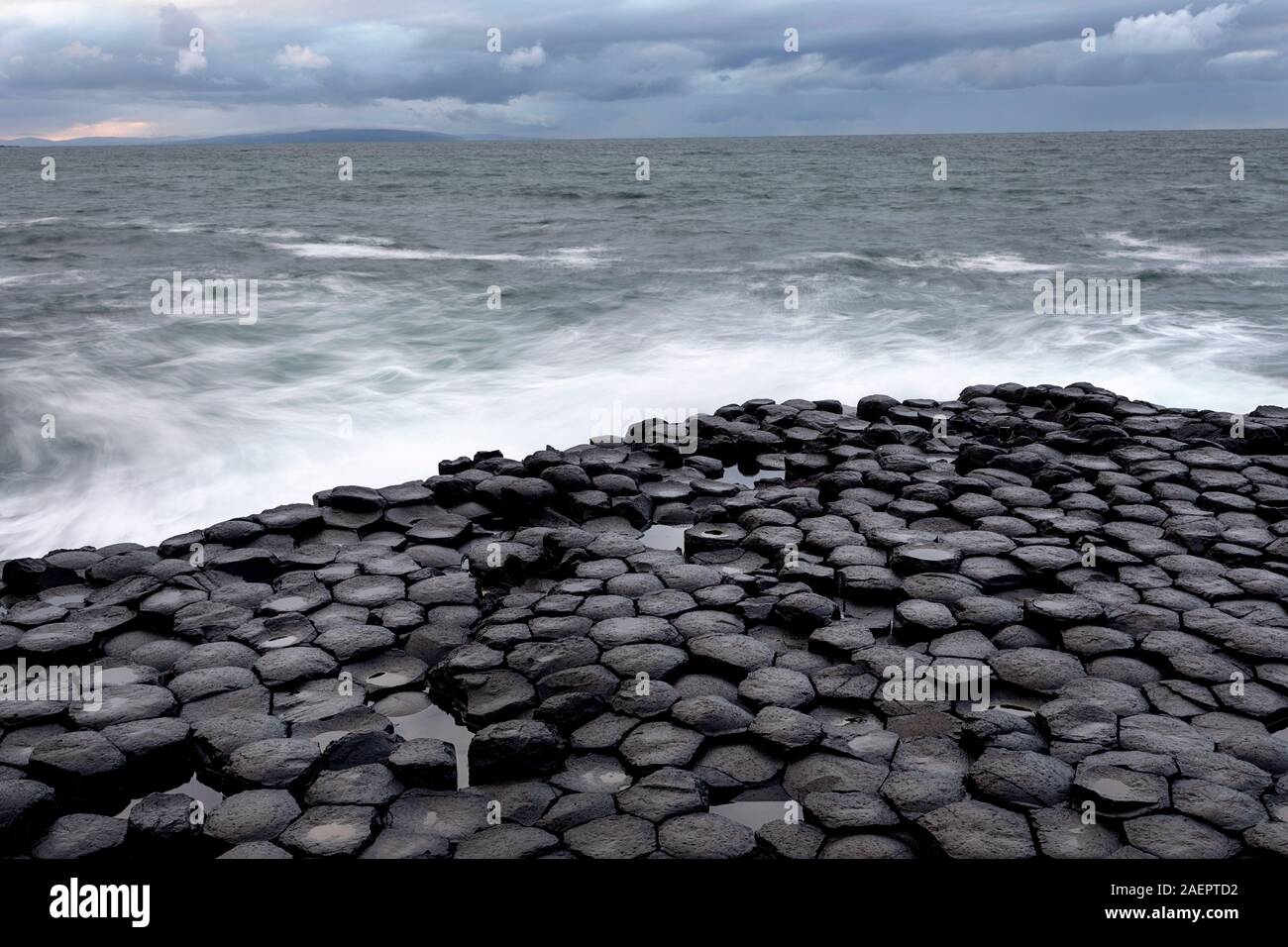 Hexagonal shapes of rocks and waves at Giant's Causeway, Co. Antrim ...