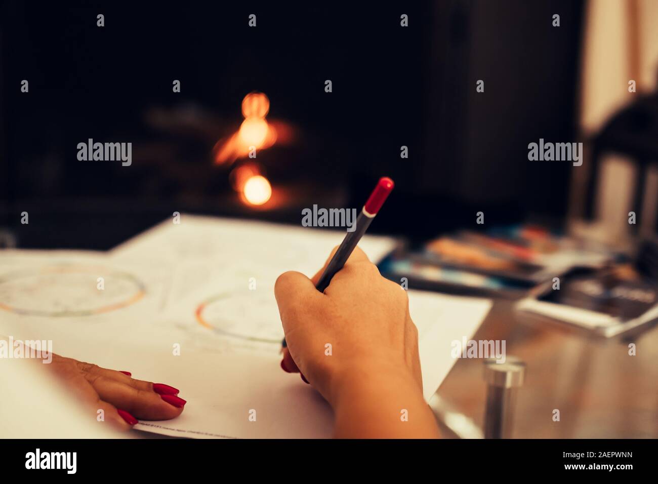 Girl artist draws a sketch with a pencil. Hand drawing. Drawing a ...