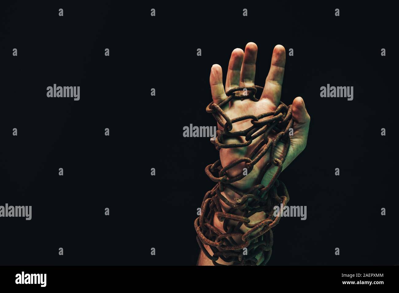 Human hand are chained in chains isolated on black background Stock ...