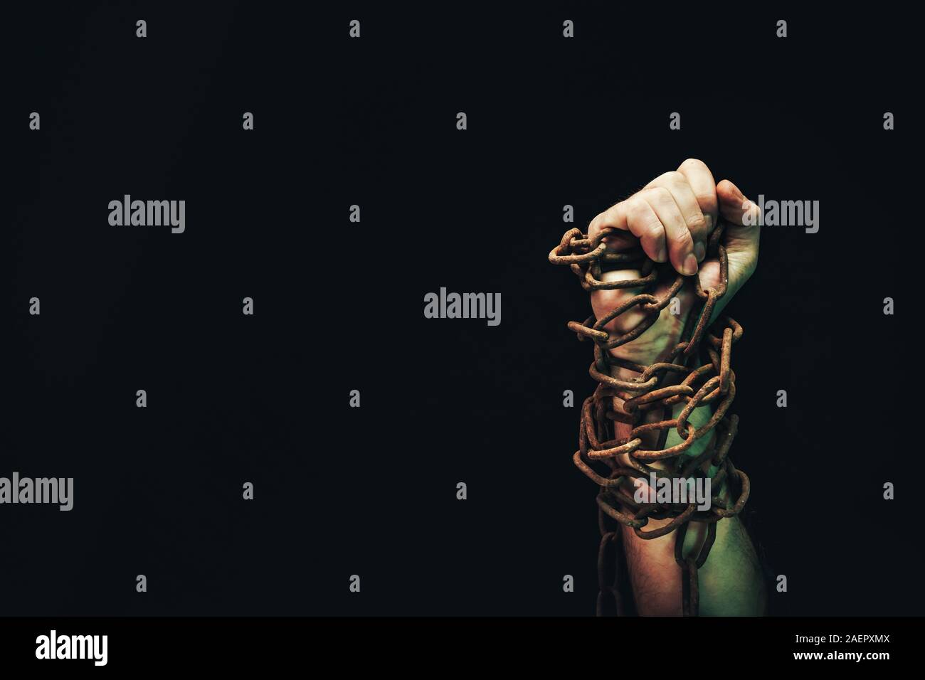 Human hand are chained in chains isolated on black background Stock ...