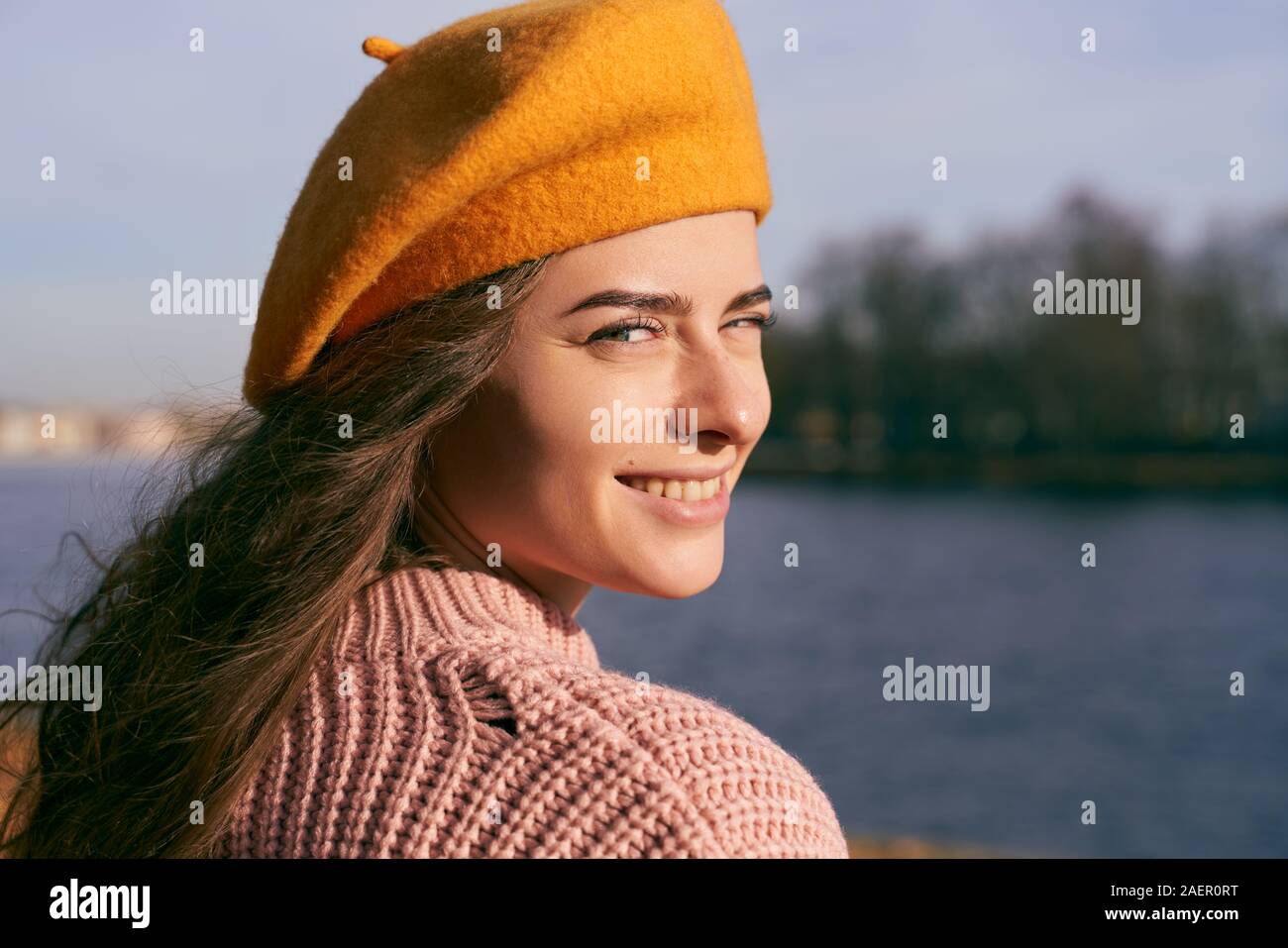 Laughing lady turns, wrinkling nose in happiness Stock Photo - Alamy