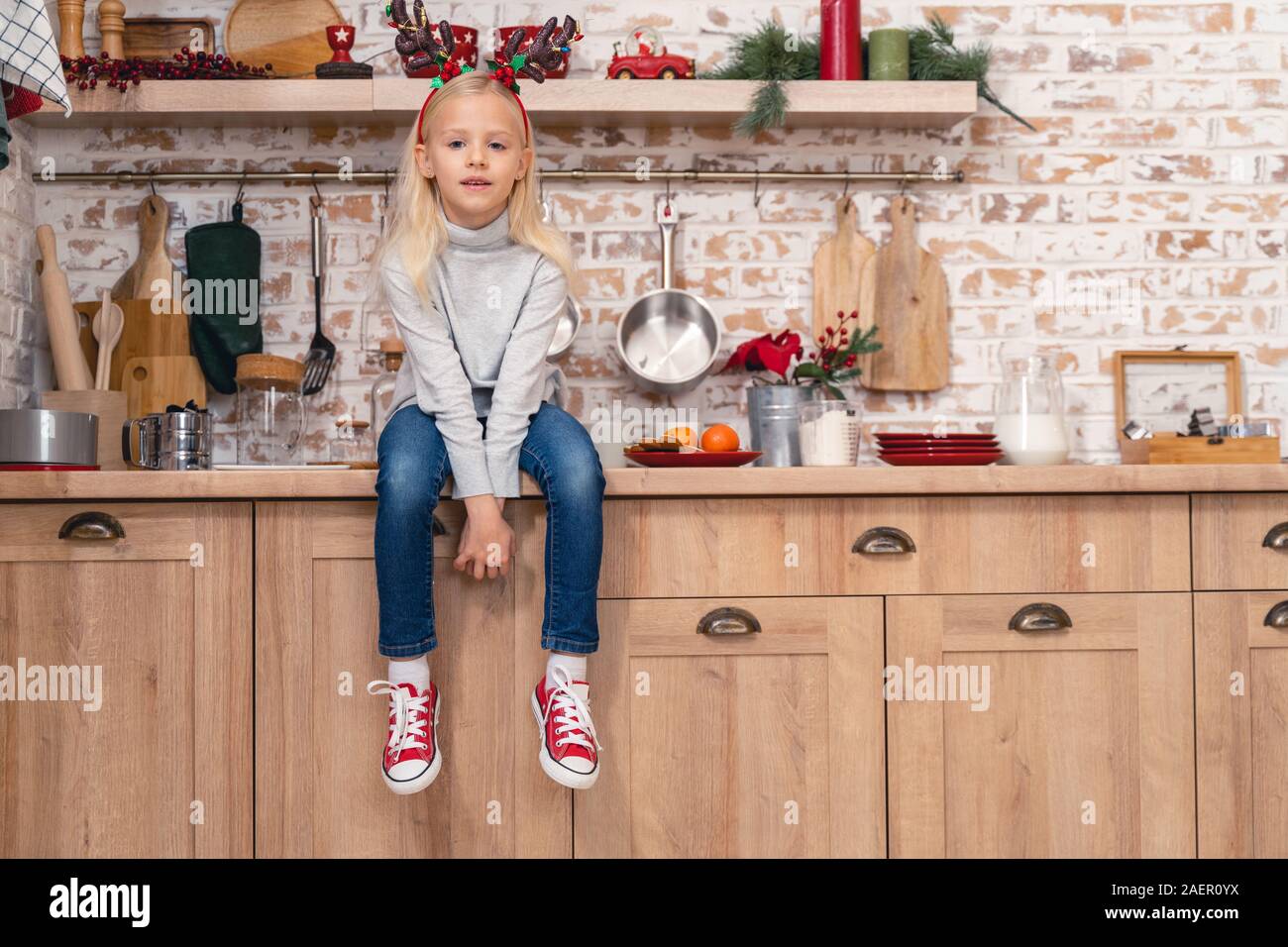Sweet child looking in front of her Stock Photo - Alamy