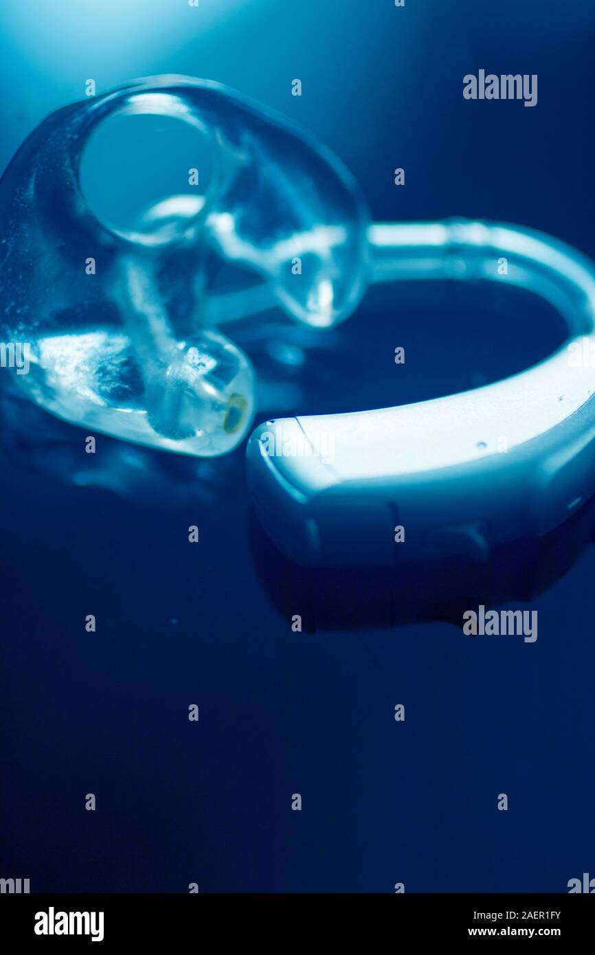 Modern digital hearing aid for deafness and deaf people Stock Photo - Alamy