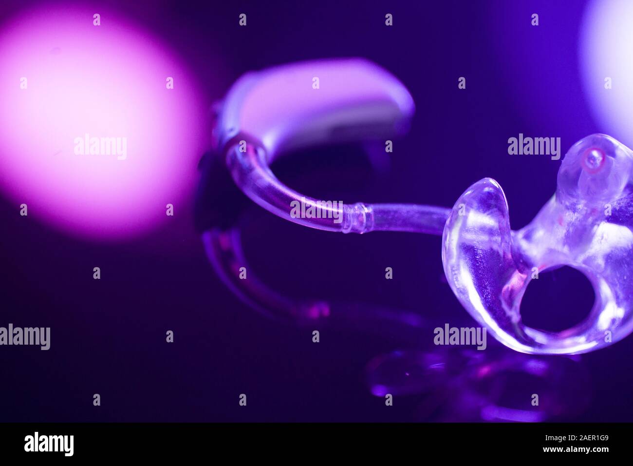 Modern digital hearing aid for deafness and deaf people Stock Photo - Alamy