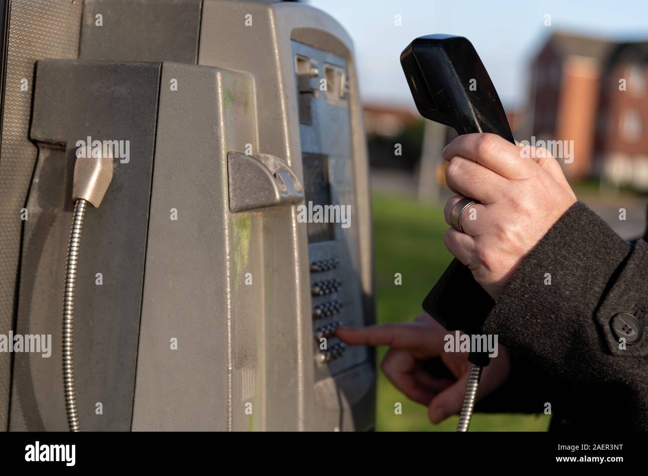 Close up of a telephone in an outdoor public phone booth box in United ...