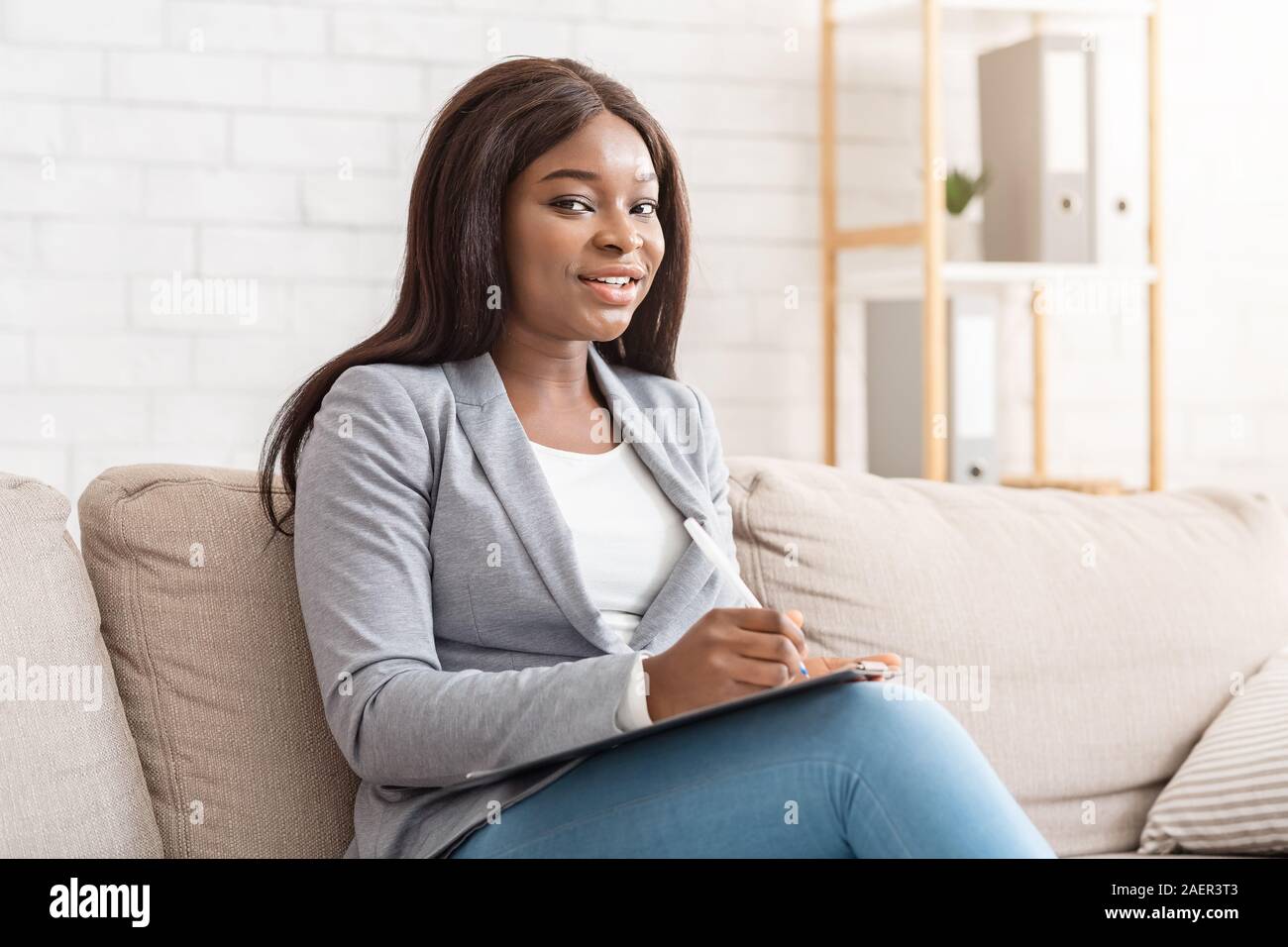 Portrait female psychologist sitting hi-res stock photography and ...