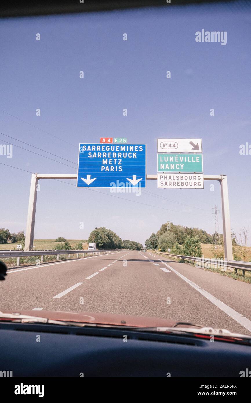 Street Sign indicating distance to Paris, France Stock Photo - Alamy